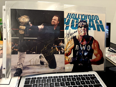 THREE 8 x 10 PHOTOS SIGNED BY THE UNDERTAKER, HOGAN AND SABLE ...