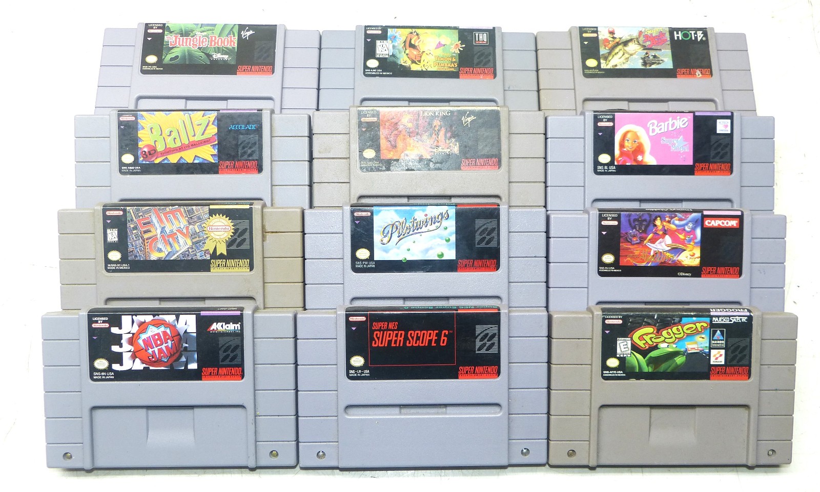 Lot of 13 SNES Nintendo Game Cartridges Frogger, Sim City, Disney ...