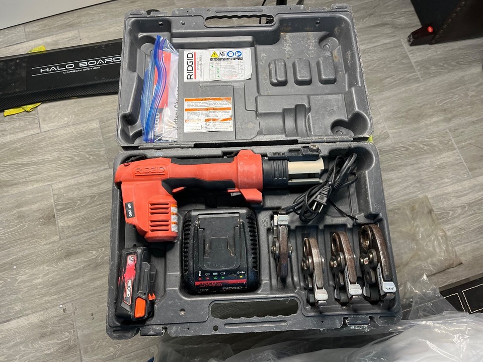 Ridgid RP 200-B Compact press tool 1 battery 1 charger 4 jaws, and the ...