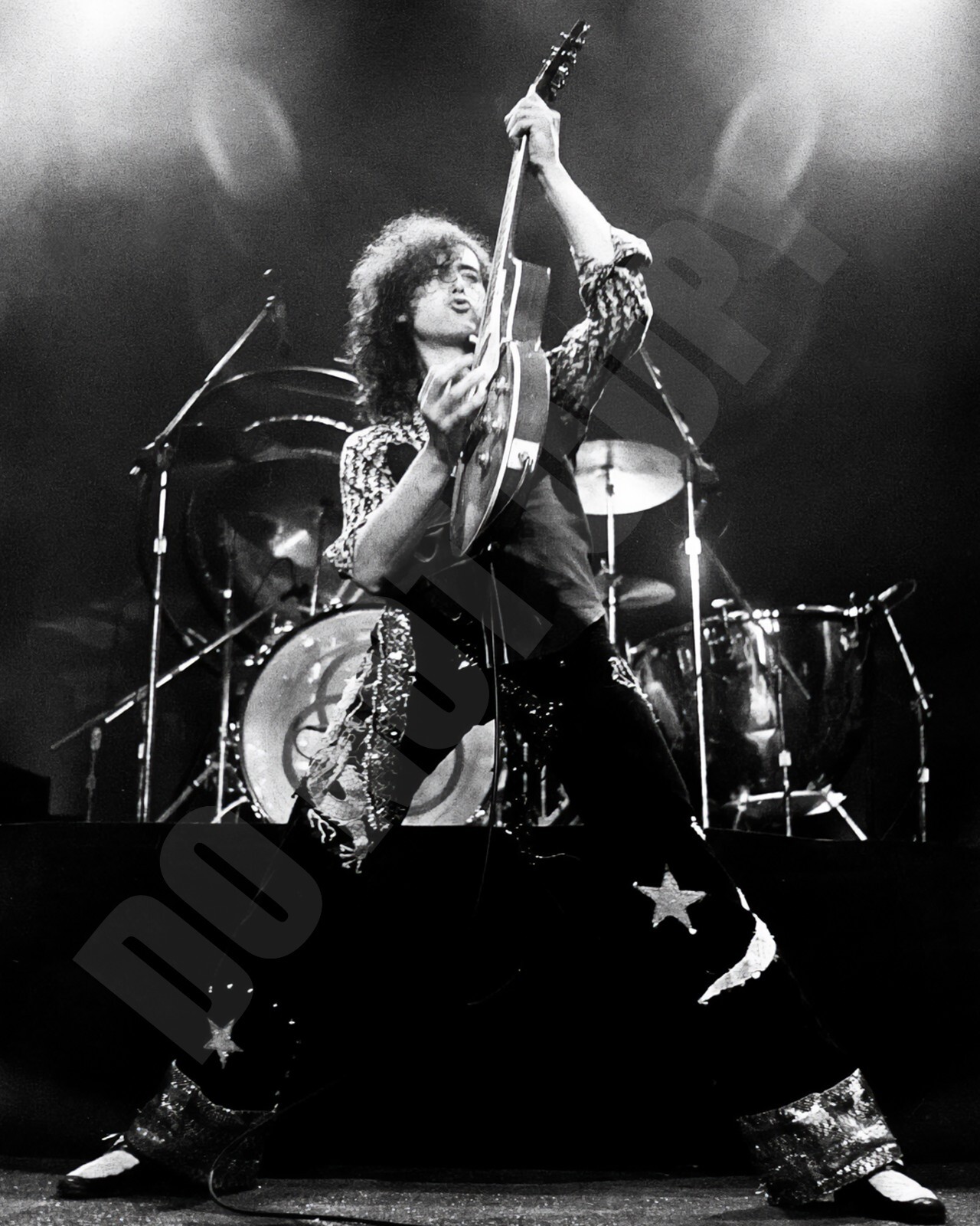 JImmy Page Led Zeppelin Playing Guitar With Star Studded Pant Concert ...