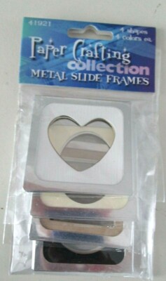 PAPER CRAFTING COLLECTION..METAL SLIDE FRAMES. ..4 SHAPES. LOT OF 6 ...