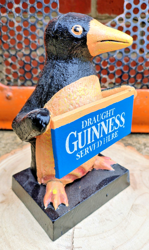 Guinness " Draught Guinness Sold Here " Cast Iron Penguin 6 inches tall ...
