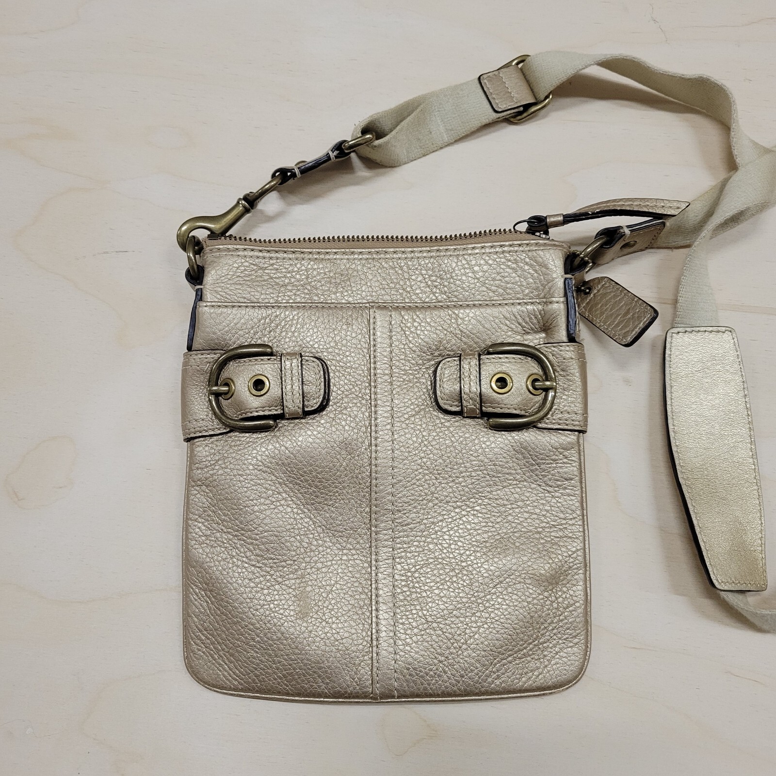 COACH Gold Pebbled Leather Swing Pack Crossbody Small… - Gem