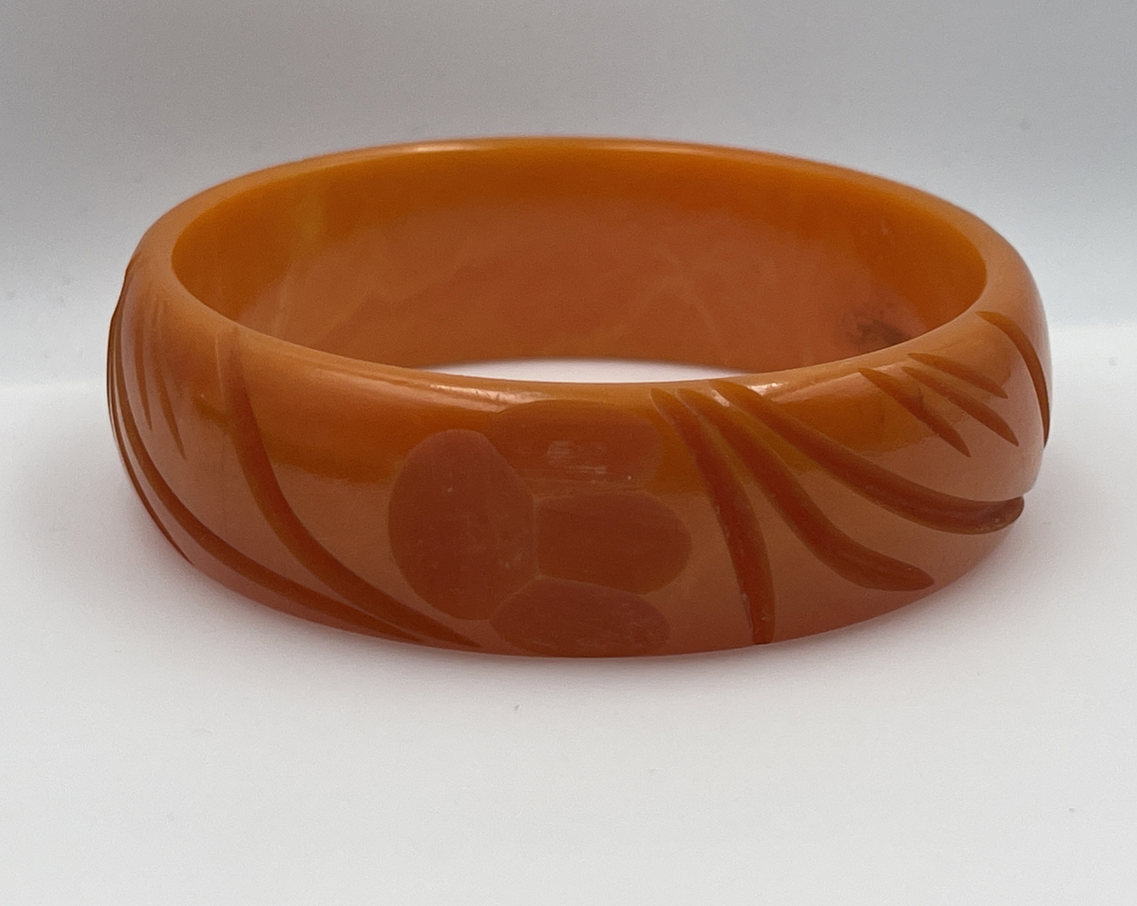 Antique Bakelite Orange Deep Carved Paw Print Bangle … - Gem