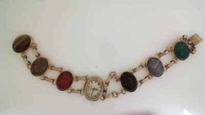 OLD ADMARK WOMEN'S 10K GOLD FILLED WRIST WATCH WITH SCARABS....IT WORKS ...