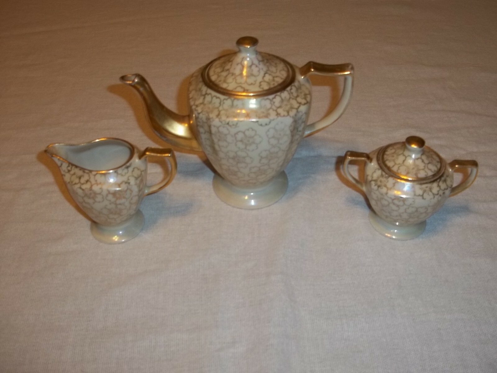 vintage tea set cream color with gold flower pattern and gold handles ...