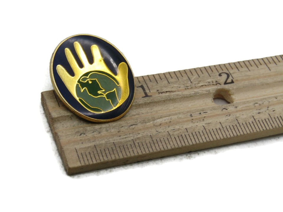 Vintage World in Hand Lapel Pin Gold Tone Earth Globe Environmental ...