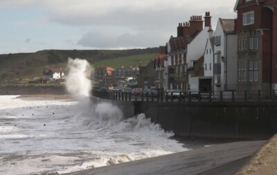 Photo 6x4 Stormy Sea at Sandsend Sandsend/NZ8612 The buildings along ...