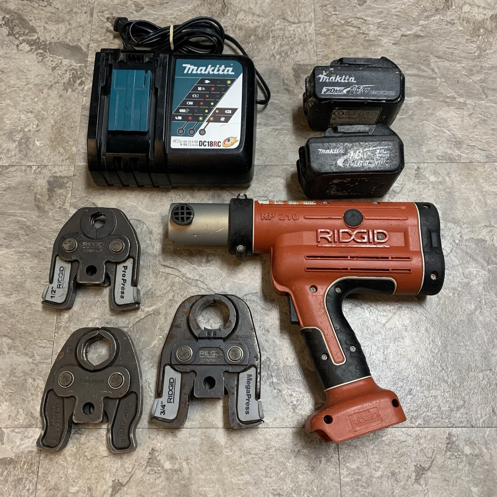 Ridgid RP210 Compact press tool With 3 Jaws Battery And Charger | eBay