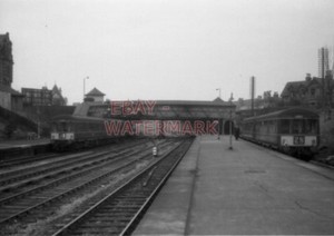 PHOTO 2 CAR SUBURBAN SETS AT LARBERT STATION ONE ON LEFT WITH SERVICE ...