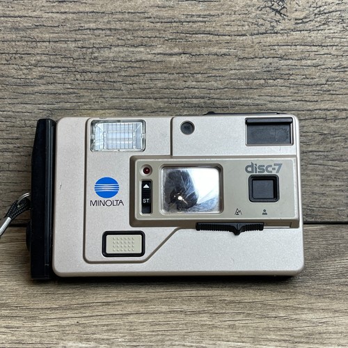 Vintage Minolta Disc-7 Gray 35mm Built In Flash Point & Shoot Compact ...