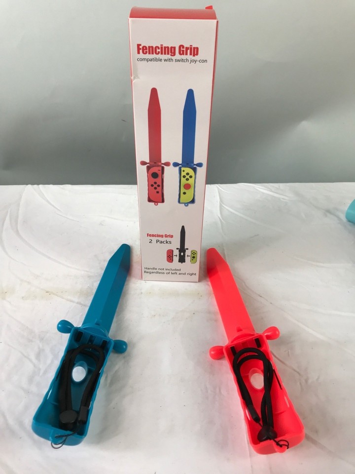 Lot of 17 Wii Games, 2 Fencing Grips and 2 Nintendo Switch Gun ...