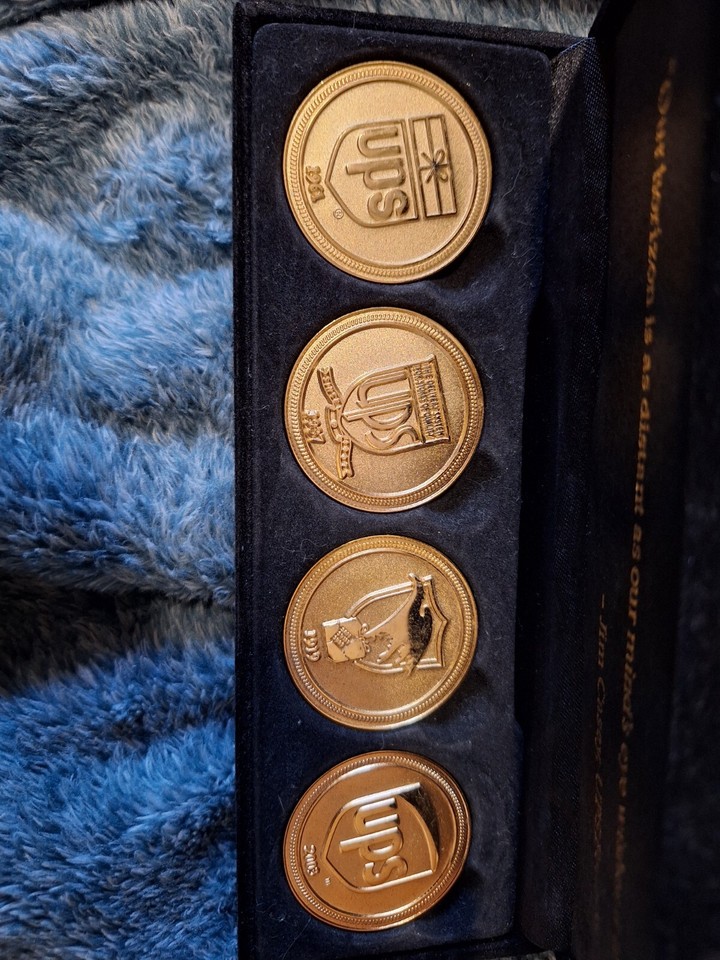 United Parcel Service UPS Four Golden Medals Rare All UPS Logos Coins ...