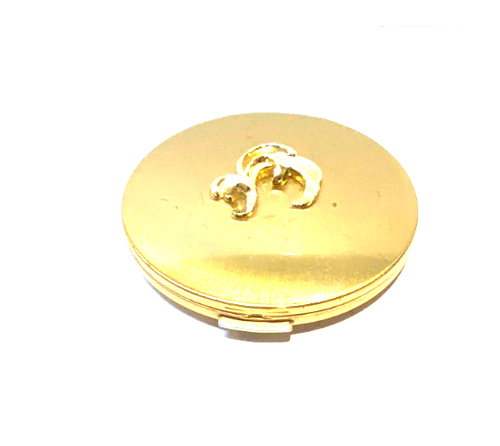 VINTAGE STRATTON SLIM GOLD POWDER COMPACT WITH A CENTRAL LID CARTOUCHE ...