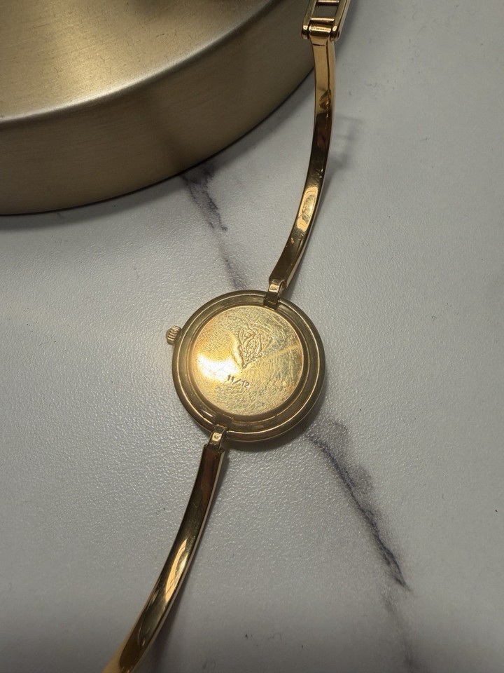 Gucci Change Bezel Women's Quartz Gold Bangle Watch Interchangeable ...