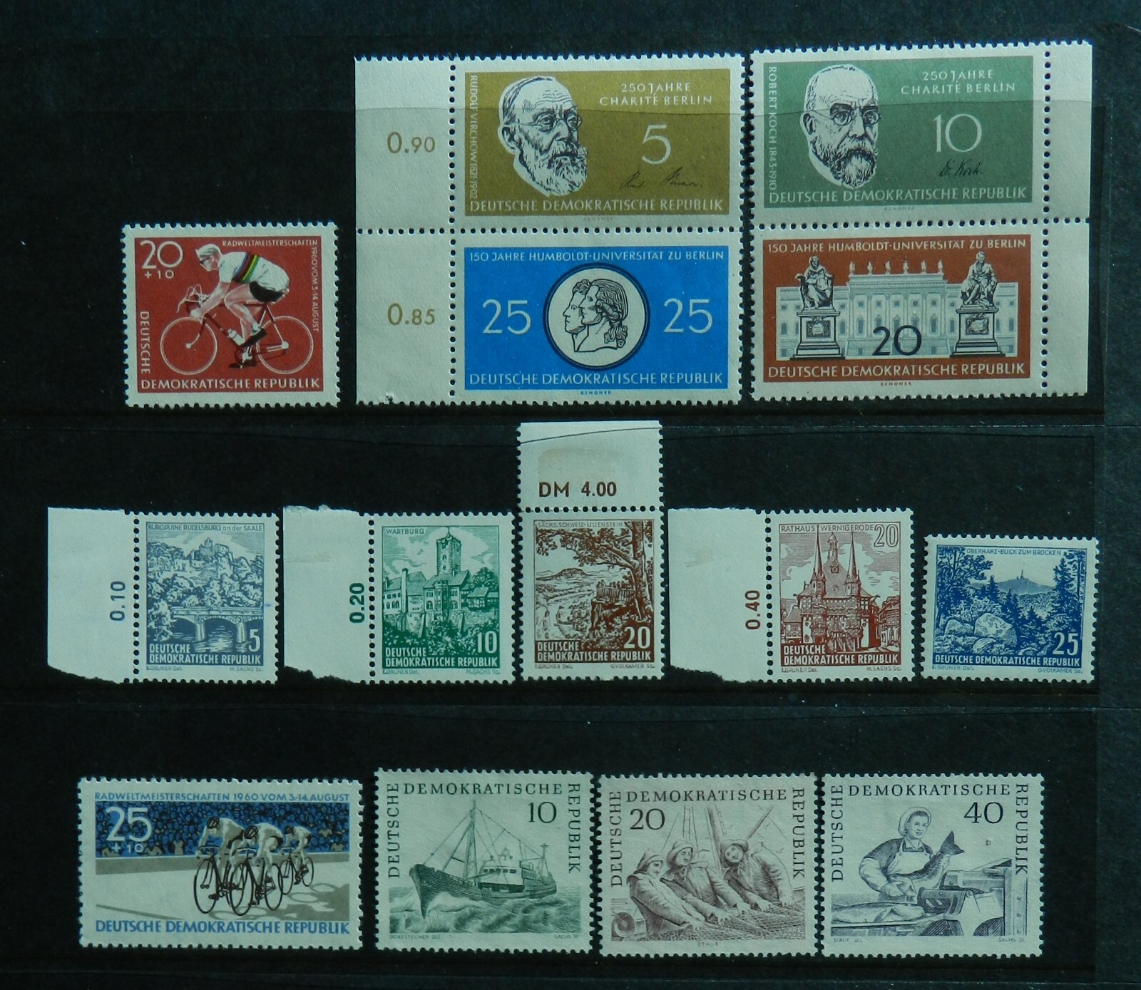 East Germany 1960/61 14 stamps SG E512/555 range Mint hinged cat £9.90 ...