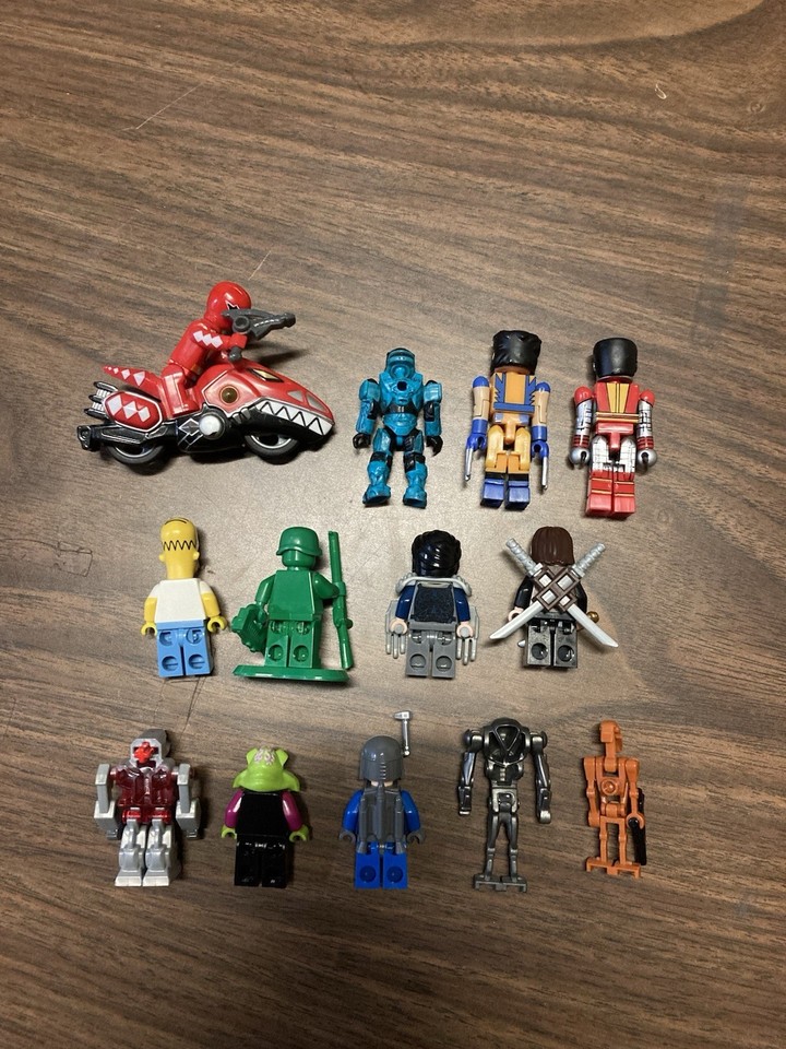 9 Lego MInifigures, 2 minimates, 2 mega bloks figures, and brick arms ...