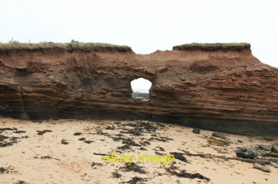 Photo 12x8 Seahole surgery? A wave-cut arch in a narrow headland at ...
