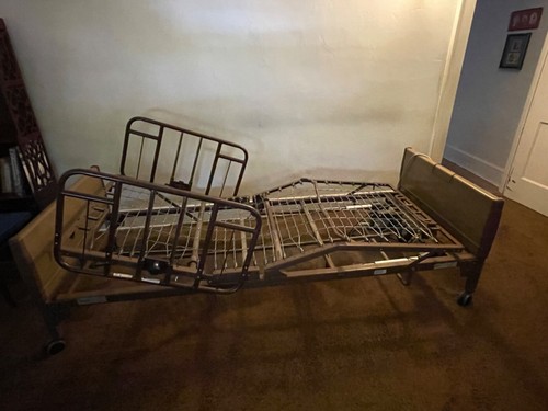 Invacare twin-size hospital bed (electric) with safety rails and ...