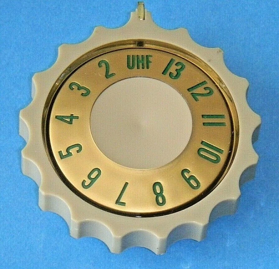 The knobs on this old TV are for the 6 channels they had back then ...