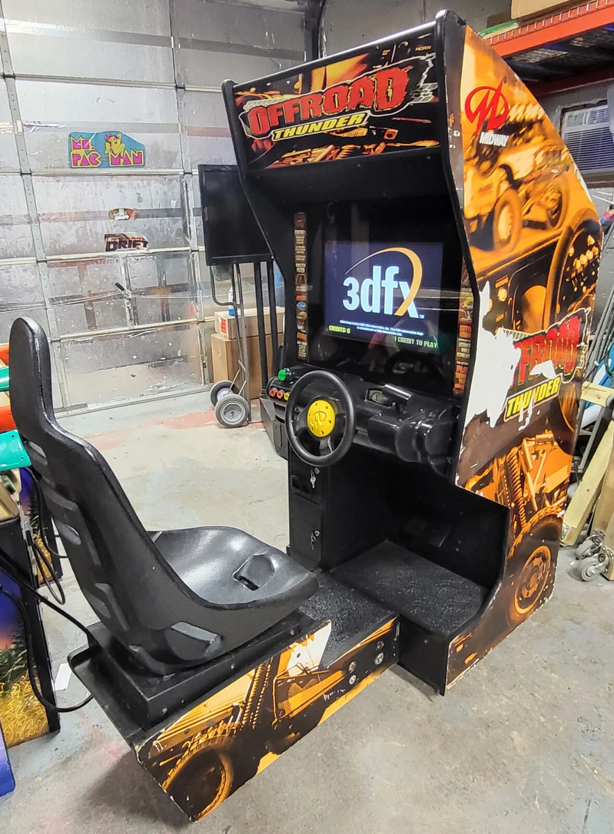 Man Playing Arcade Car Game
