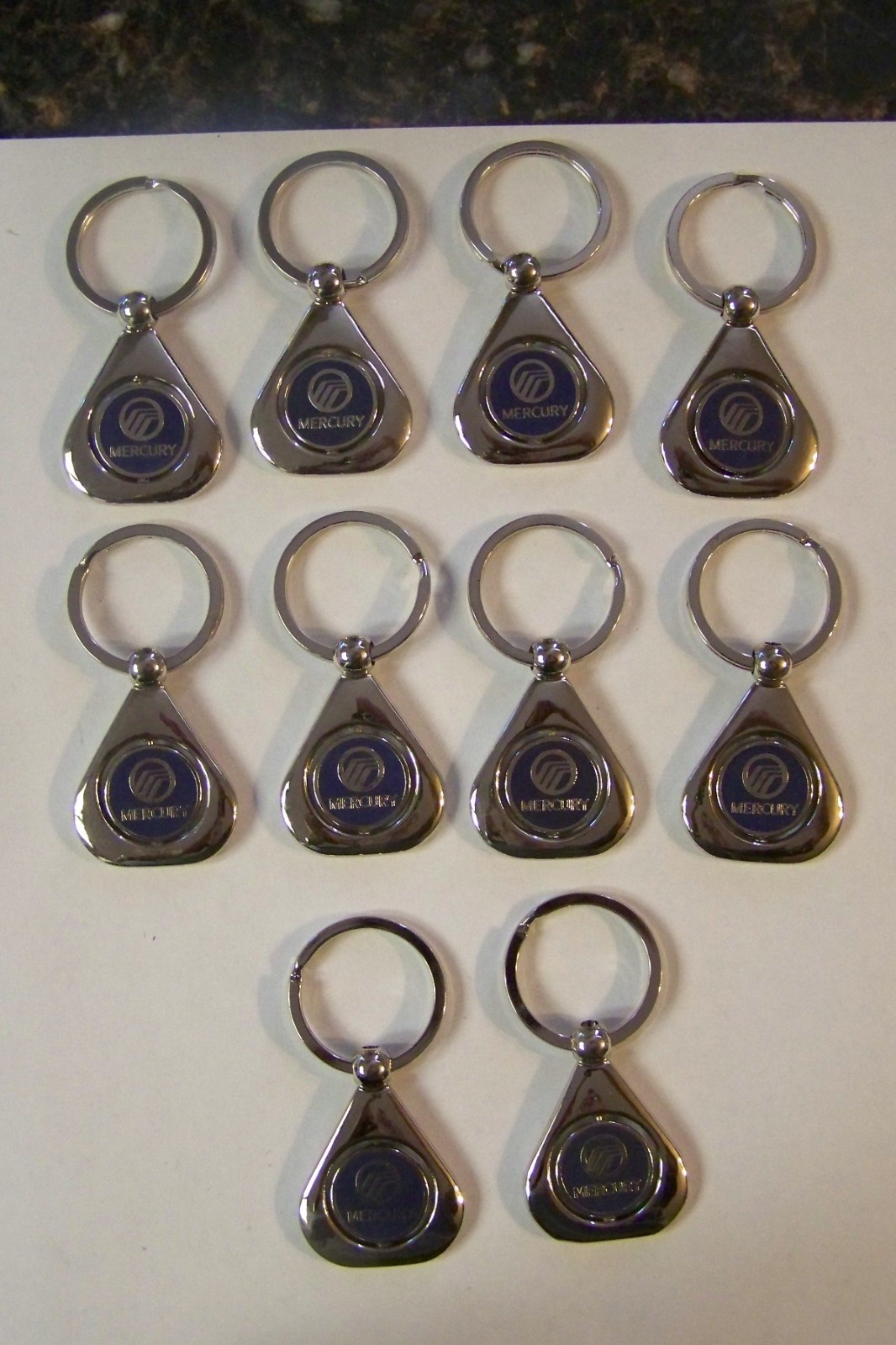 MERCURY BLUE SPINNER METAL KEY CHAINS QTY 9 | eBay