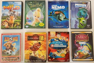 8 Disney DVD Wild, Tinker B, Nemo, Monster, Air Bud, Lion King ...