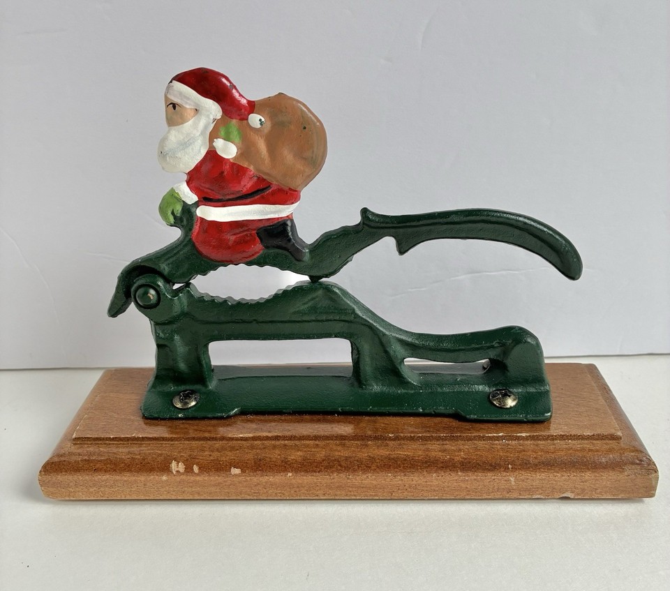 Vintage Cast Iron Nutcracker Santa Clause & Toy Bag Wooden Base | eBay
