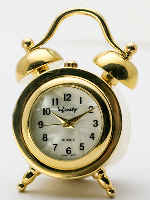 INFINITY: GOLD TONE OLD BELL STYLE COLLECTABLE ANALOG QUARTZ MINI-CLOCK ...