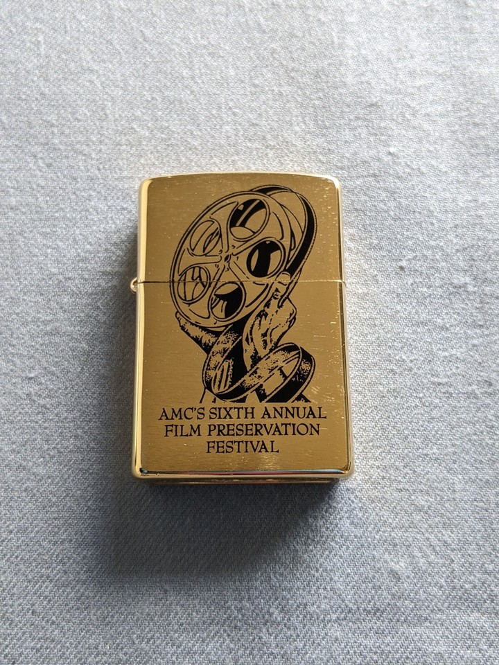 VTG 1996 AMERICAN MOVIE CLASSICS AMC FILM FESTIVAL GOLD PLATED ZIPPO ...