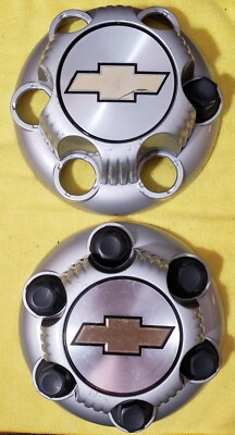 CHEVY SILVERADO SILVER 6 LUG CENTER CAPS BUYING THE PAIR SEE PICS READ ...