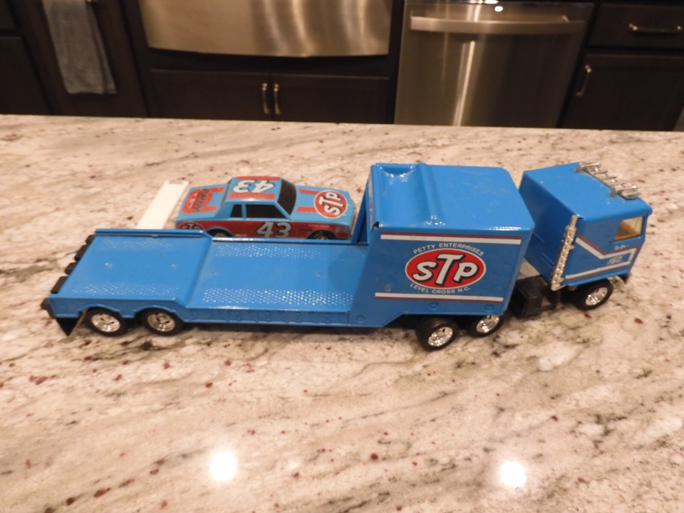 Vintage Ertl Richard Petty STP Car Hauler Pressed Steel Truck Car | eBay