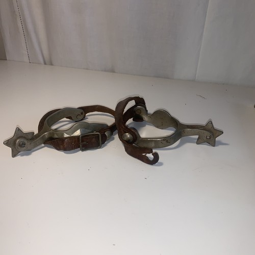 Antique cowboy spurs with star & leather straps | eBay