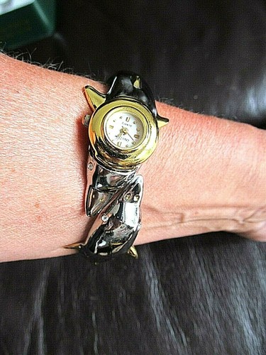 Louis Delon dolphin silvertone metal watch | eBay UK