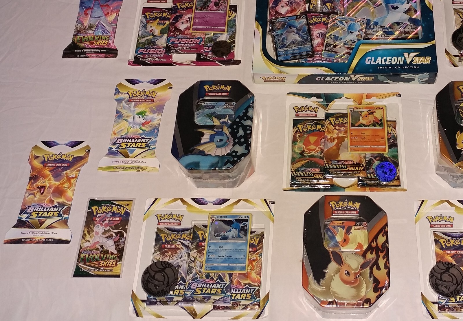 57 Pokemon Packs 🤗Tins - 3 Pack Blister Packs - 14 Evolving Skies Packs ...