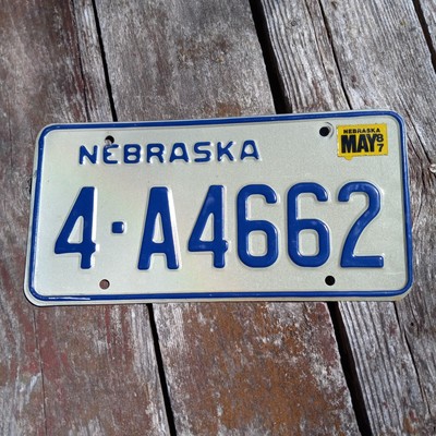 1987 Nebraska License Plate - "4 - A4662" (navy on offwhite) MAY 87 ...