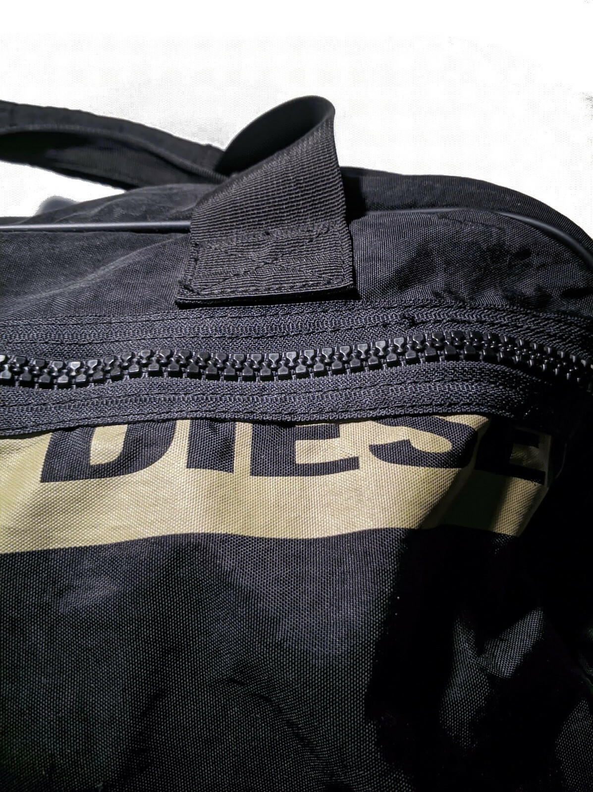 DIESEL Spare Parts Black / Gold Leather Bottom Duffel… - Gem