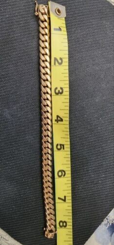 10 karats of 49 grams of SOLID gold Cuban link style … - Gem