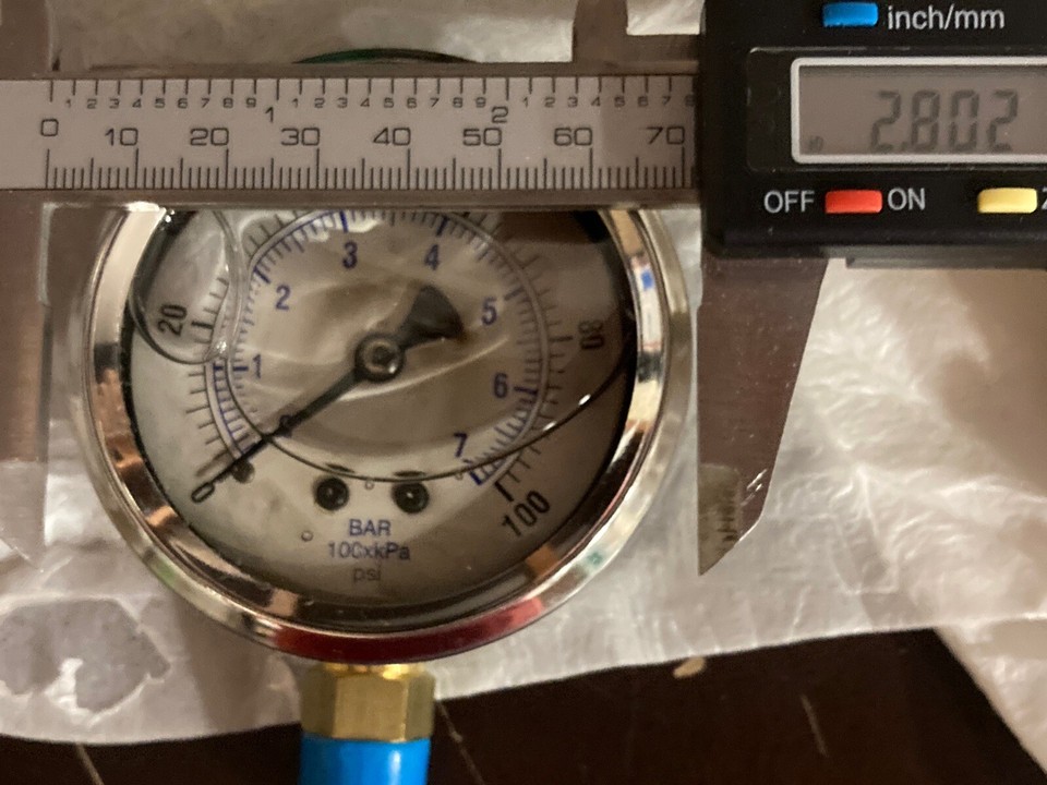 lot of 3 gauges; 2 100 psi oil filled gauge 1/2”, 1 no fill 2 1/2” face ...