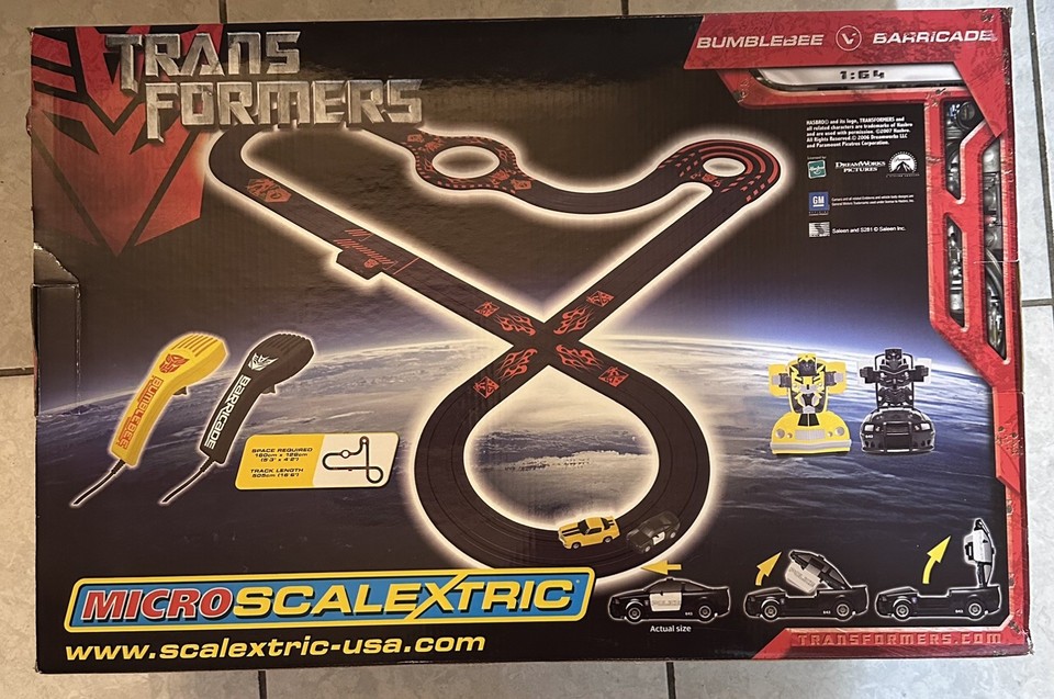 SCALEXTRIC 1/64 TRANSFORMER BUMBLEBEE BARRICADE SLOT CAR RACING SET | eBay