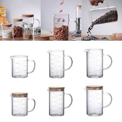 Graduated glass mugs, jugs, transparent heat-resistant containers ...