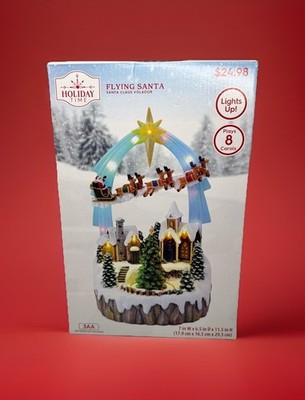 Holiday Time Flying Santa Lights Up Plays 8 Carols 3AA Batteries ...
