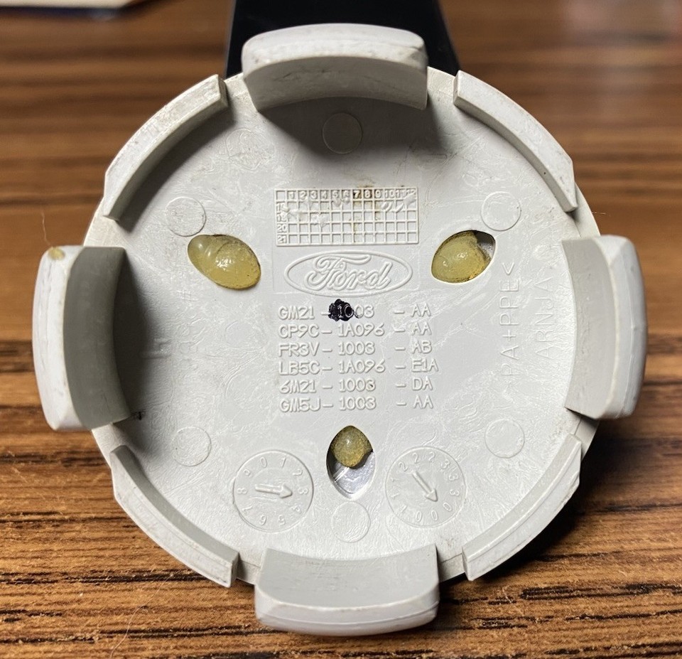 OEM Set of 4 Dark Blue Ford Center Caps with Silver Emblem 6M211003AA ...