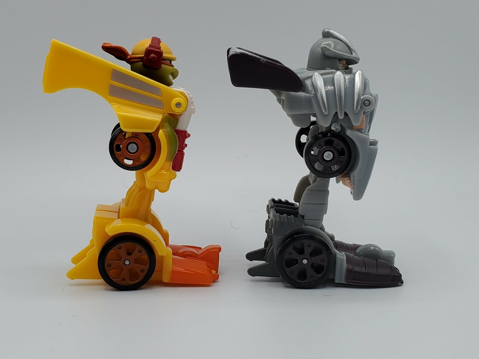 Teenage Mutant Ninja Turtles Michaelangelo And Shredder transformer Car ...