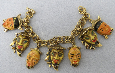 Mid Century Charm Bracelet Mask Faces Early Plastic Fold Over Catch 7. ...