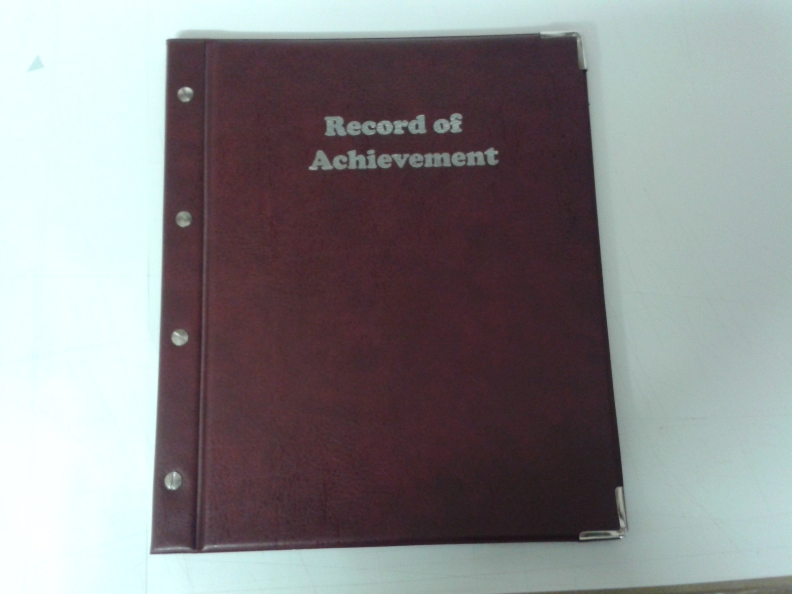 WITH YOUR OWN NAME EMBOSSED -RECORD OF ACHIEVEMENT IN BURGUNDY LEATHER ...