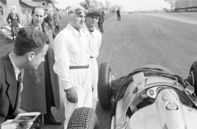 Hermann Lang standing next to his Mercedes-Benz W154 1938 Racing Old ...
