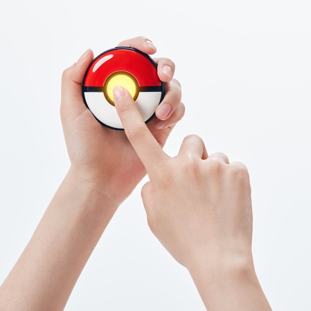Hand Holding Pokeball