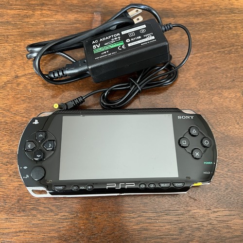 PSP 1001 + Official Sony Memory 1GB + Charger + New Battery + Tony Hawk ...