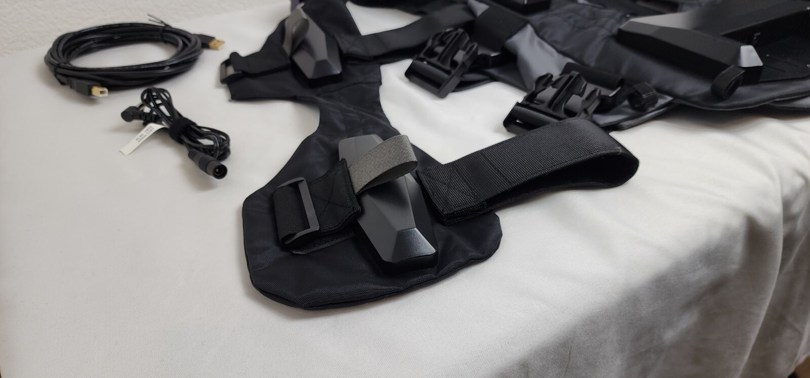 Hardlight VR Suit - Haptic Feedback Motion Tacking Jacket Virtual ...